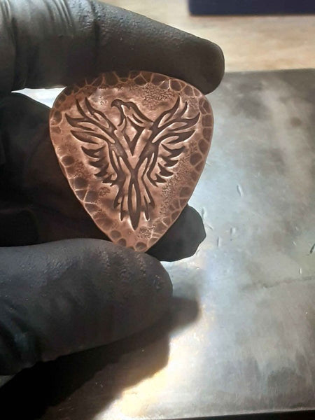 copper guitar pick with Phoenix – Nici's Picks