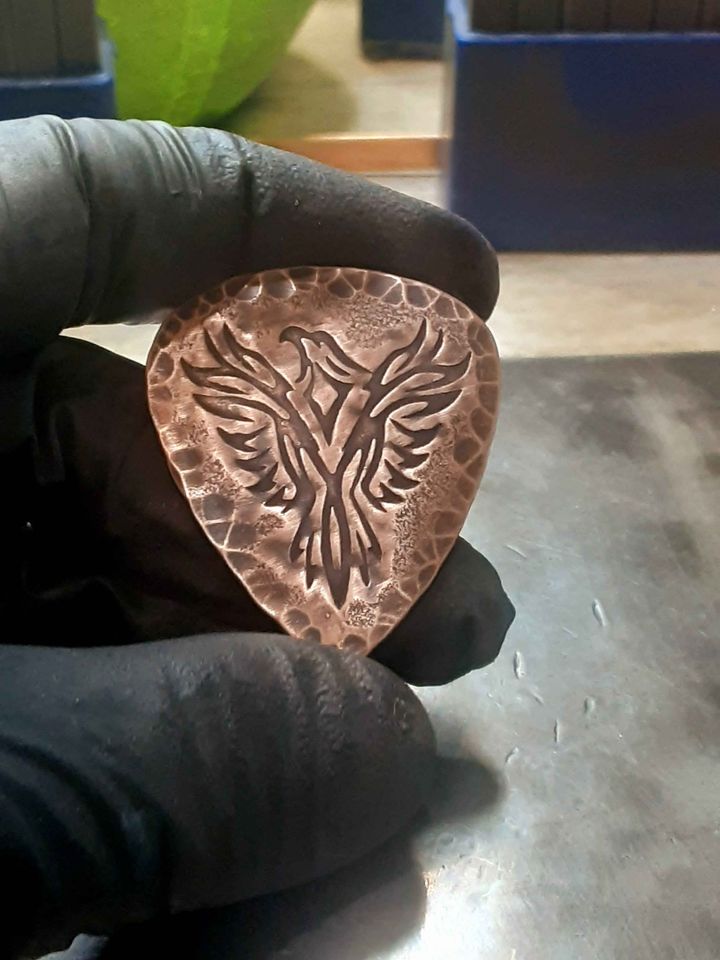 copper guitar pick with Phoenix – Nici's Picks