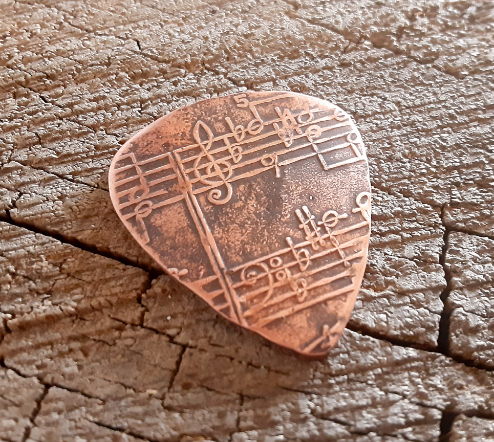 handmade and playable copper pick with music notes – Nici's Picks