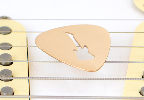 Guitar Pick rocking out a Guitar Cut Out in Bronze – Nici's Picks
