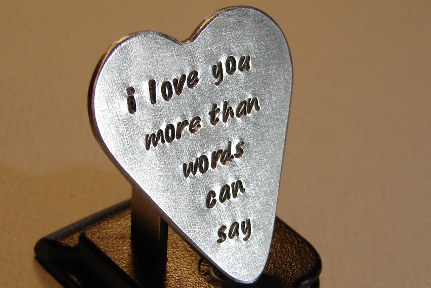 heart shaped guitar pick in sterling silver – Nici's Picks