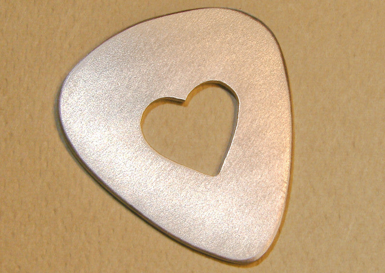 Heart shaped guitar pick in aluminum for you to personalize – Nici's Picks
