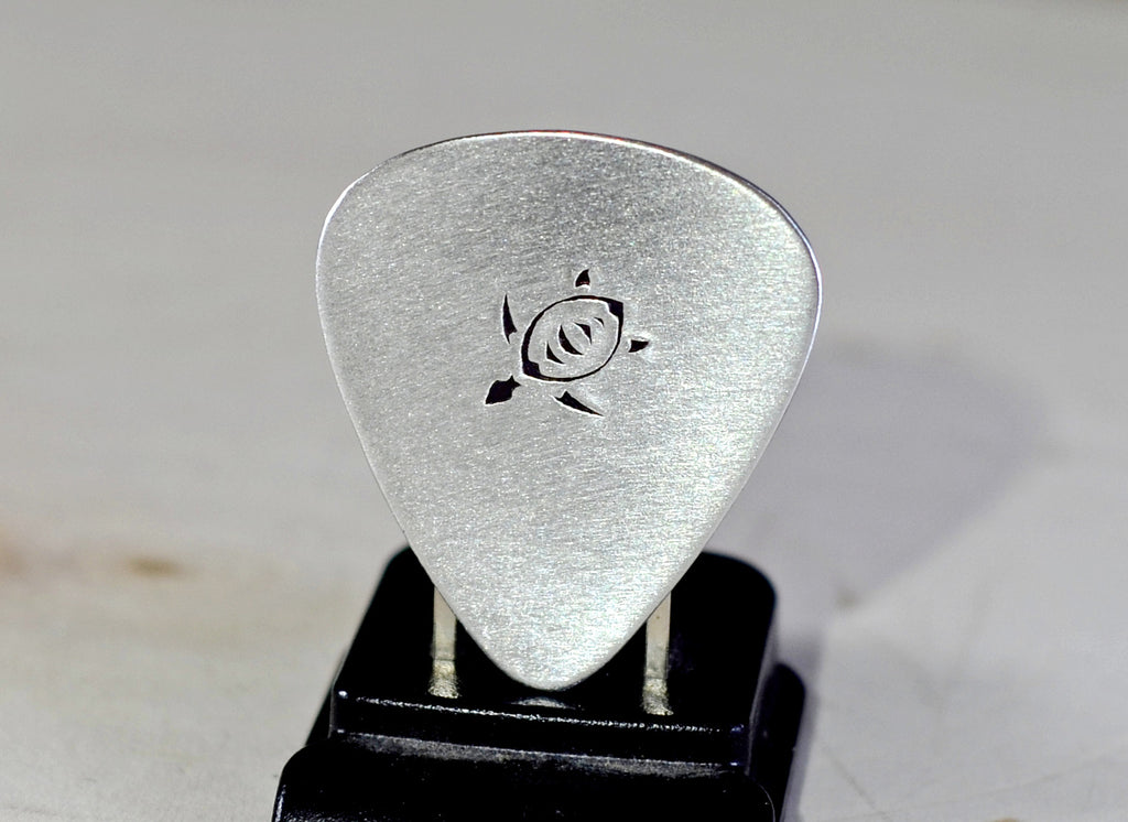 Sea turtle guitar pick handmade in aluminum – Nici's Picks
