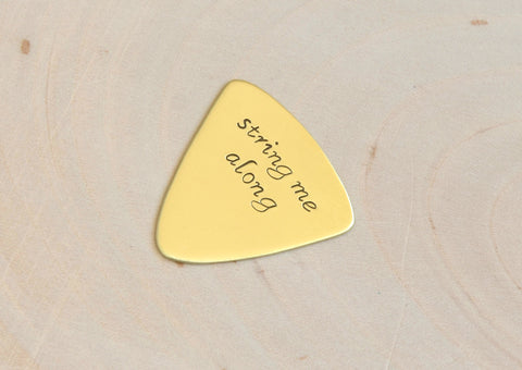 String me Along Triangular Brass Guitar Pick – Nici's Picks